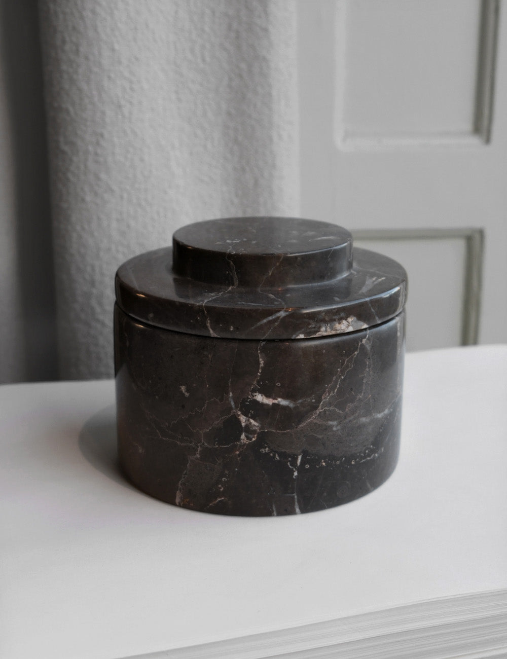 AURA canister in shadow black marble – BRANDT Copenhagen